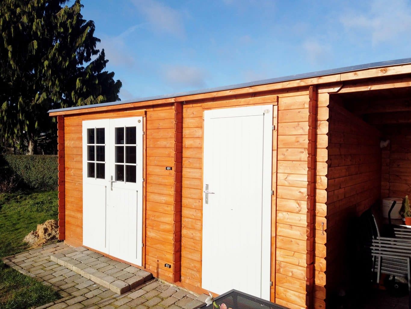 Læs, hvordan et skur til haven har givet tre ekstra rum