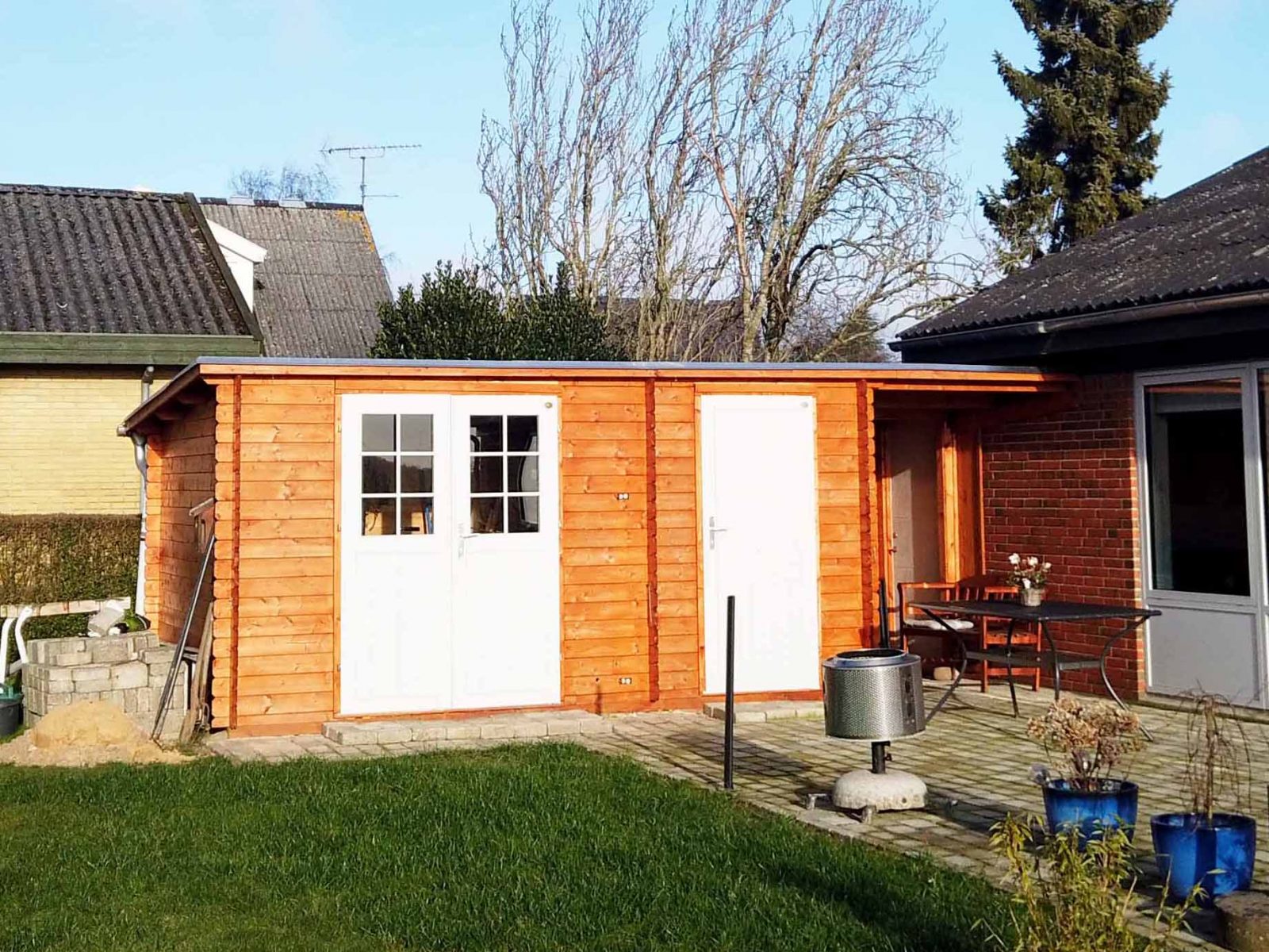 Læs, hvordan et skur til haven har givet tre ekstra rum