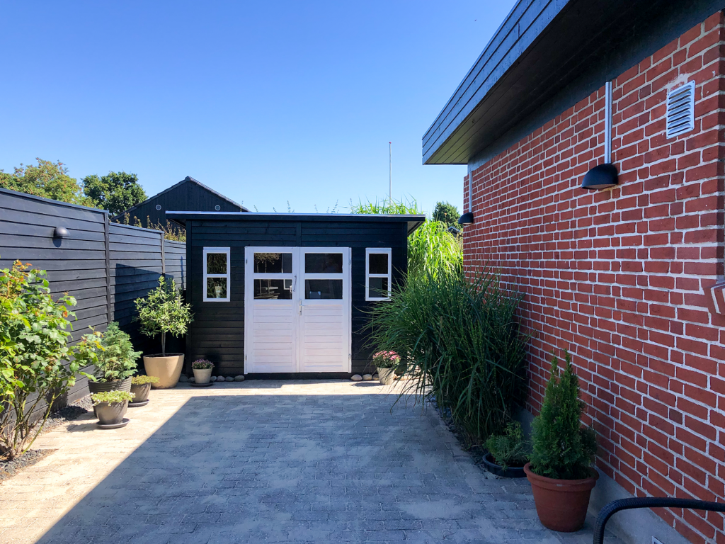 Læs, hvordan et skur til haven har givet tre ekstra rum